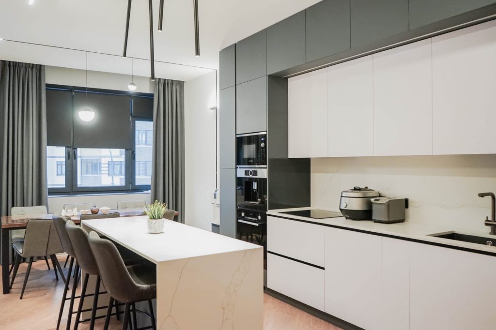 Modern kitchen design with island - VM Kitchens Dubai